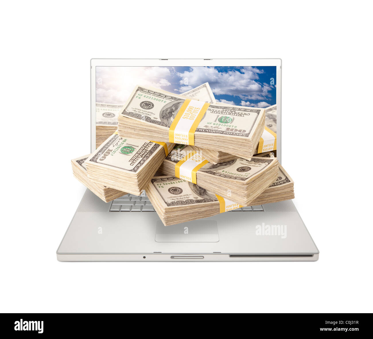 Silver Computer Laptop Isolated on White with Stacks of Hundred Dollar ...