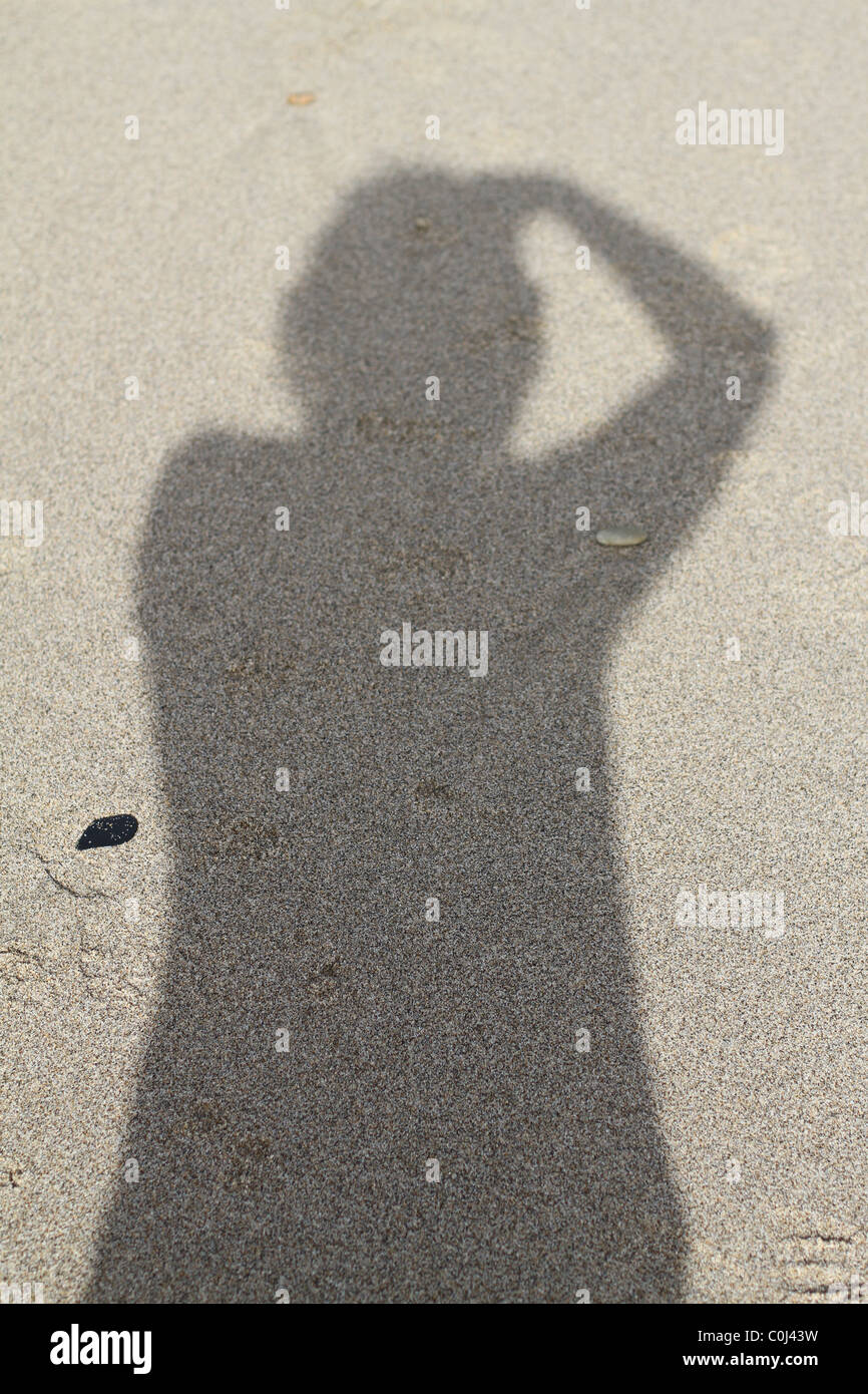 shadow of man, person on the beach Stock Photo - Alamy