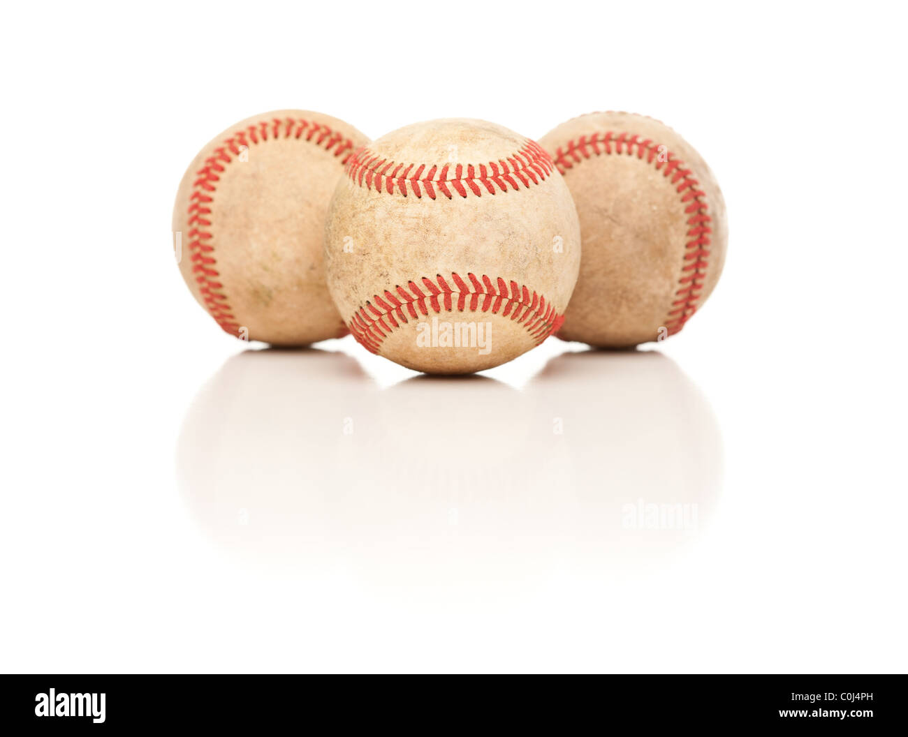 Three Baseballs Isolated on a Reflective White Background Stock Photo ...