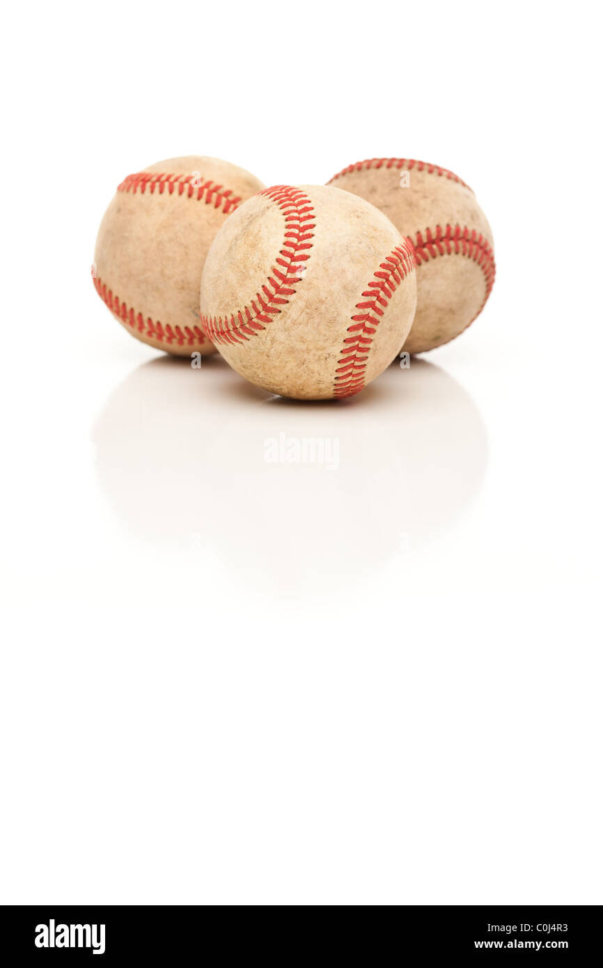 Three Baseballs Isolated on a Reflective White Background Stock Photo ...