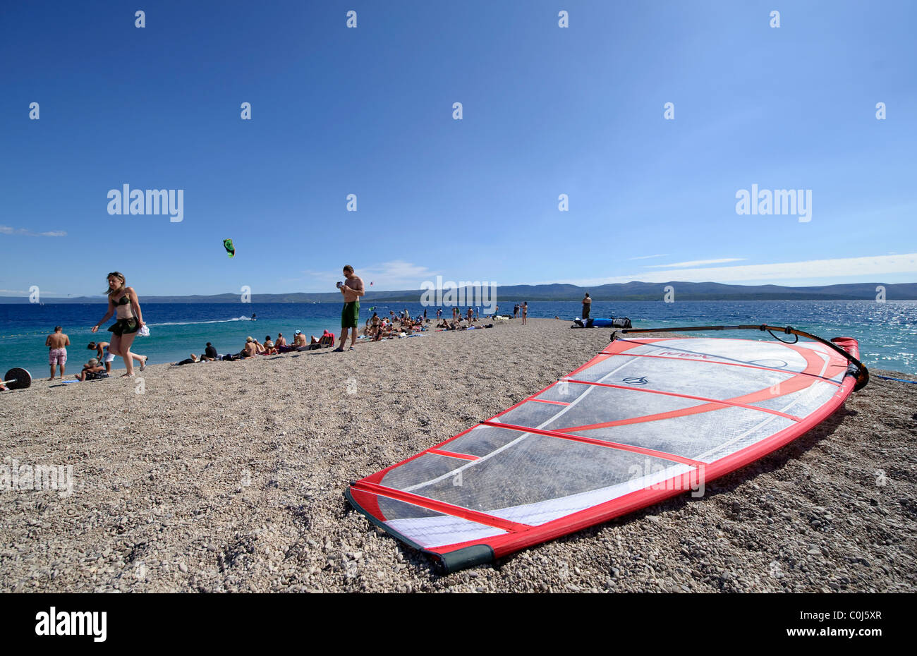 a windsurf on the shingle sand peninsula of Zlatni Rat, near Bol, Brac ...