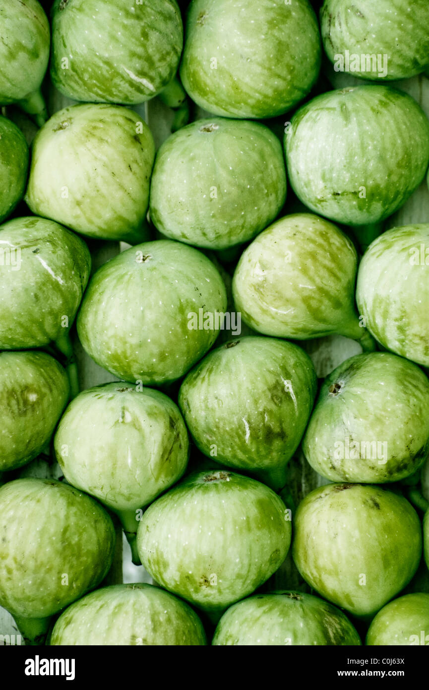 Local grown green figs for sale at a street vegetable and fruit stall ...