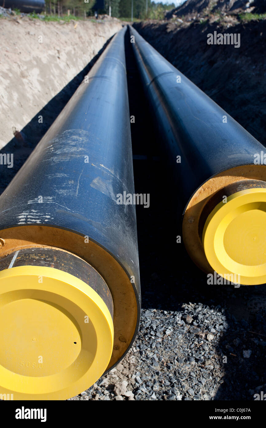 Underground district heating pipeline under construction.Part of the ...