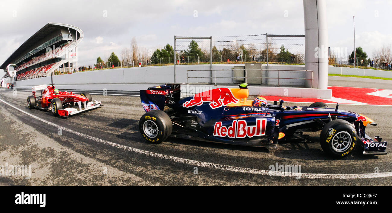 Mark Webber (AUS) in the Red Bull RB7 Formula One racecar and Massa in ...