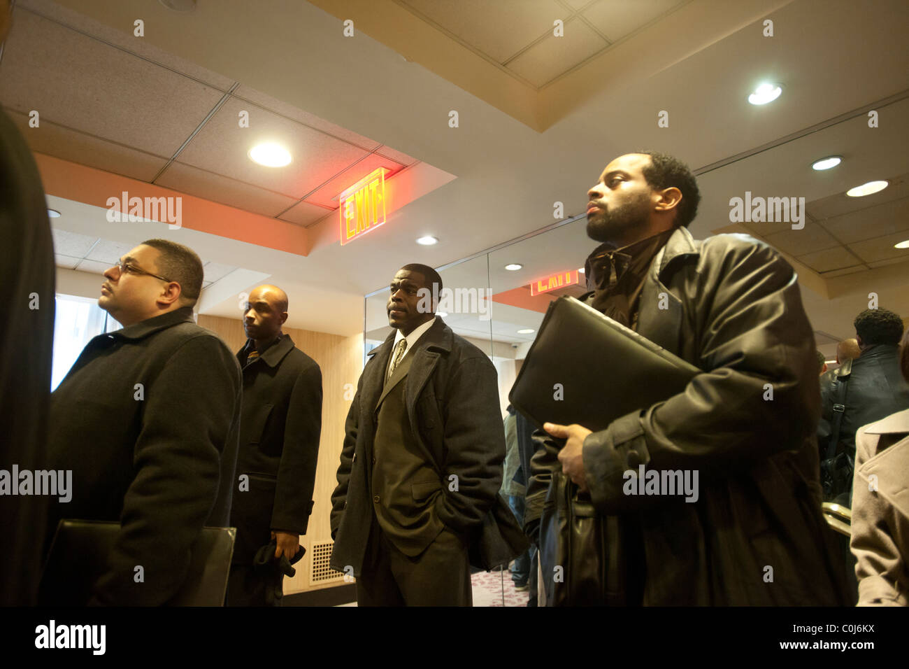Job seekers line up for a job fair in midtown in New York on Wednesday ...