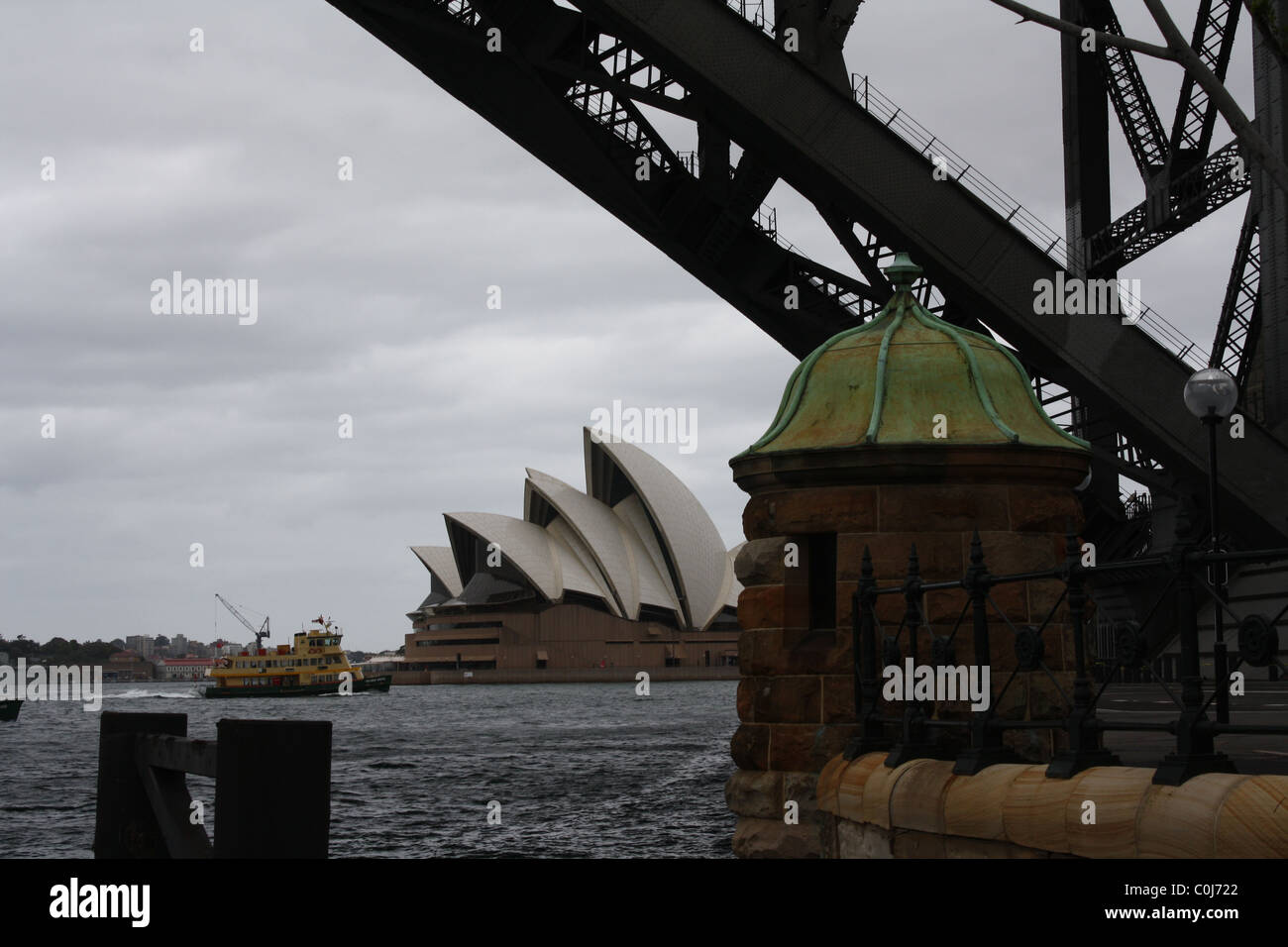 View of Sydney Opera house from under the Harbour bridge south pylon at ...