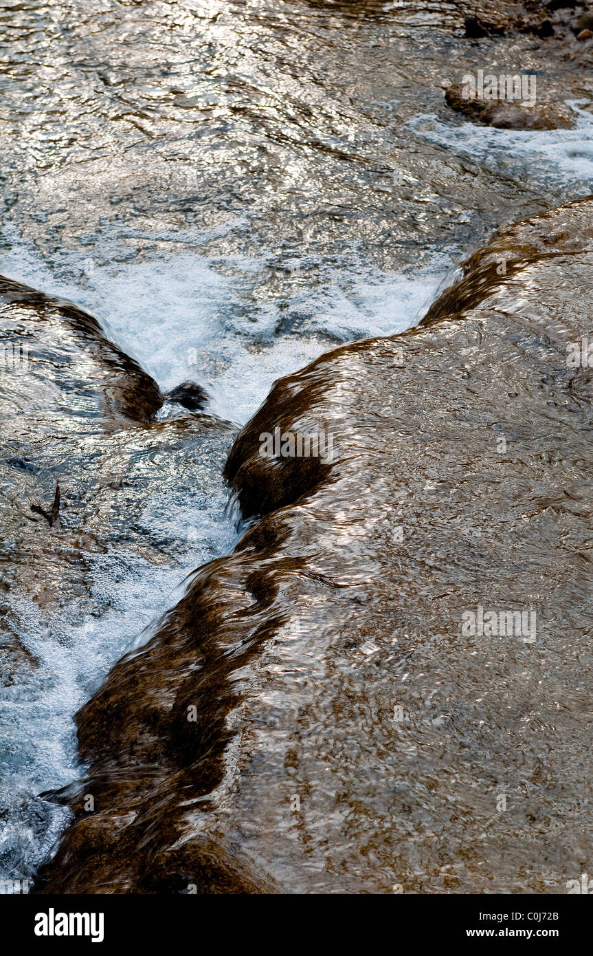 the stream trough the rocks Stock Photo - Alamy