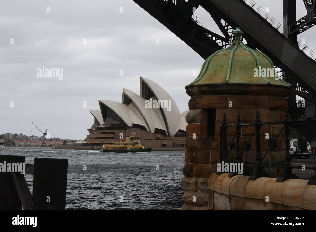 View of Sydney Opera house from under the Harbour bridge south pylon at ...