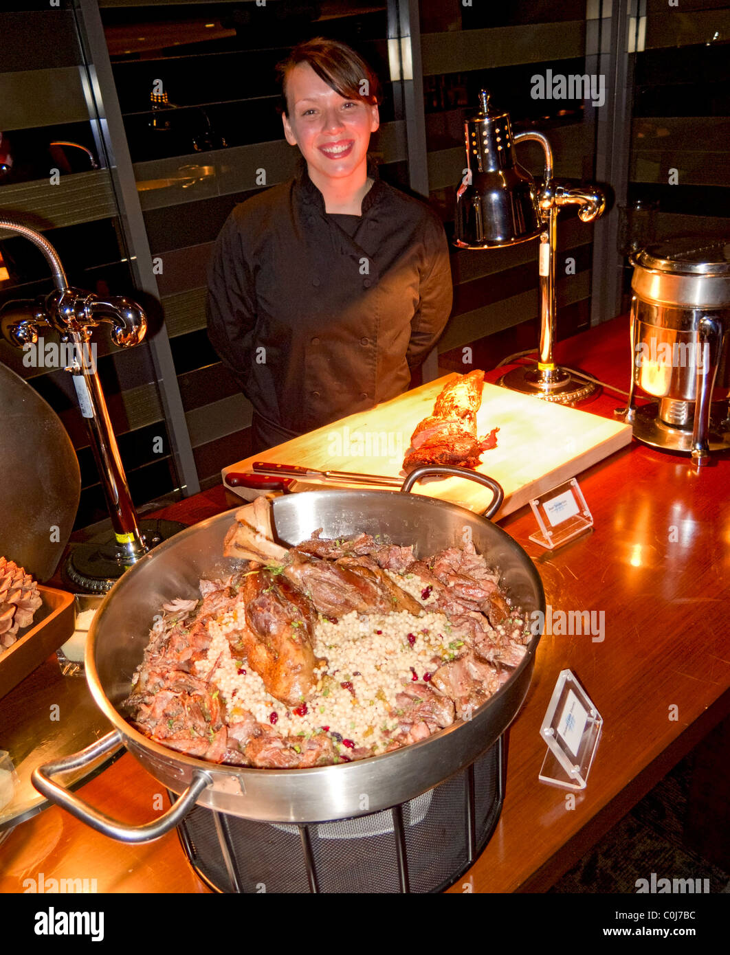 Parallax chef with her Moroccan style braised lamb shank during dinner ...