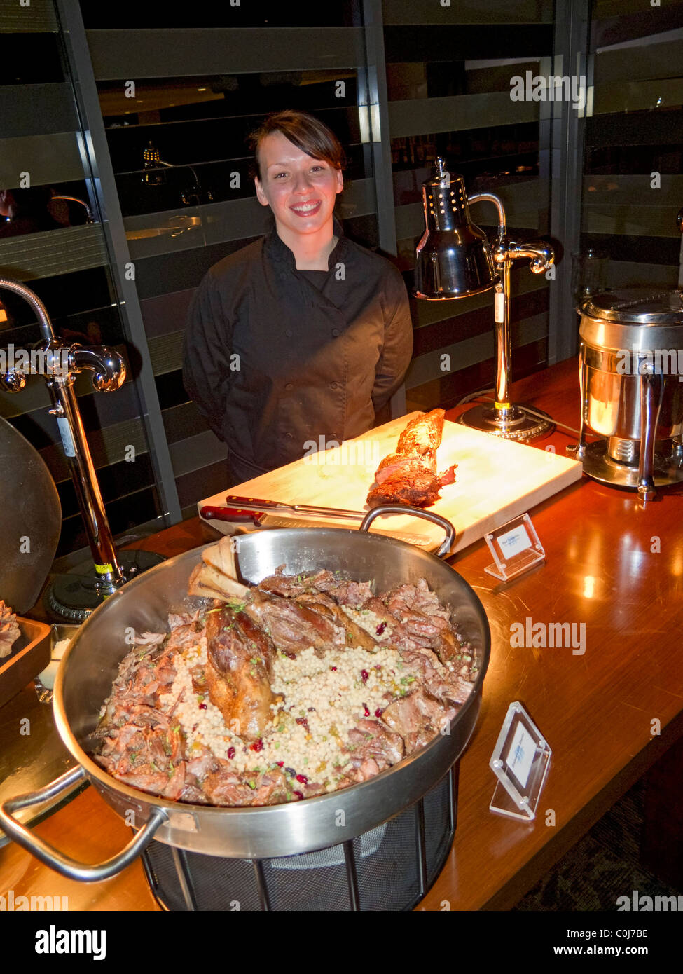 Parallax chef with her Moroccan style braised lamb shank during dinner ...