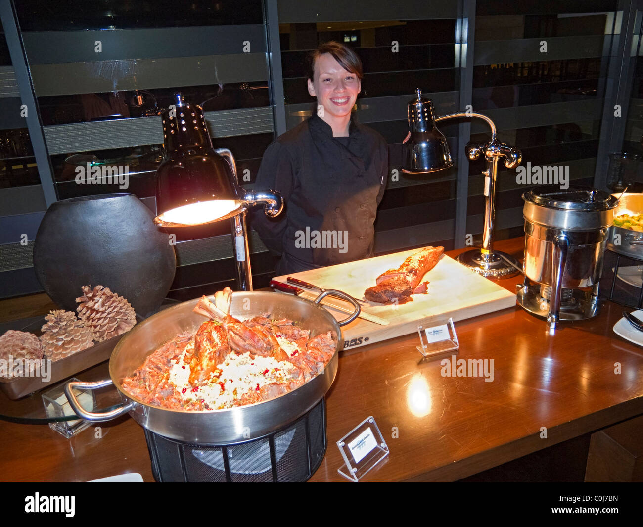 Parallax chef with her Moroccan style braised lamb shank during dinner ...