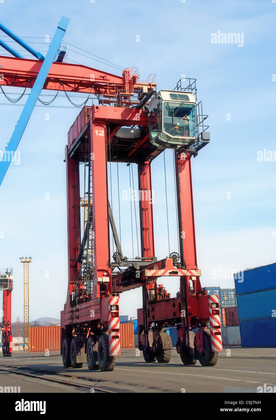 The port machine for transportation of containers Stock Photo - Alamy