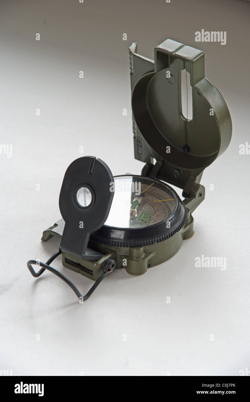 The military compass isolated on white background Stock Photo - Alamy