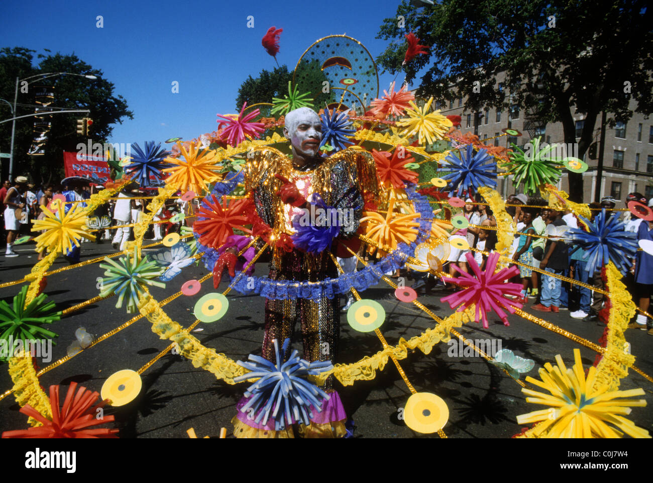 Festively costumed dancers perform in the annual West Indian American ...