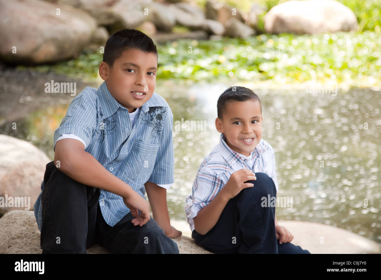 Two Handsome Hispanic Brothers at the Park Stock Photo - Alamy