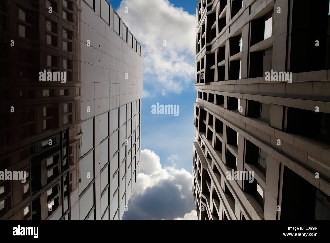 Tall buildings with a nice blue sky above them Stock Photo - Alamy