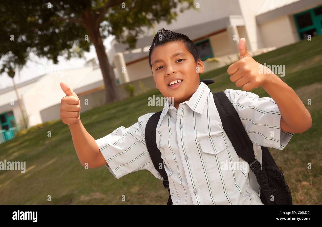 Happy Young Hispanic Boy with Backpack Ready for School Stock Photo - Alamy