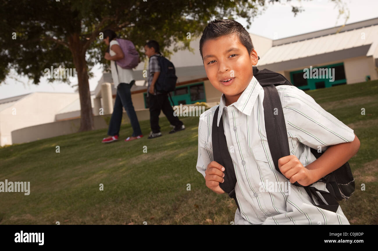 Happy Young Hispanic Boy with Backpack Ready for School Stock Photo - Alamy