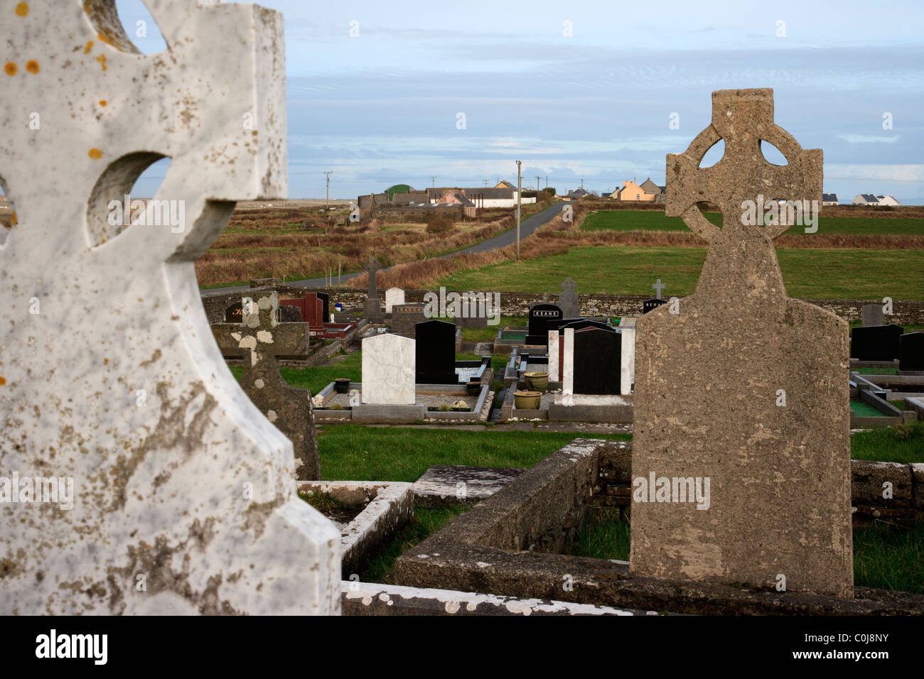 Ruined Irish church with Celtic cross gravestones Stock Photo - Alamy