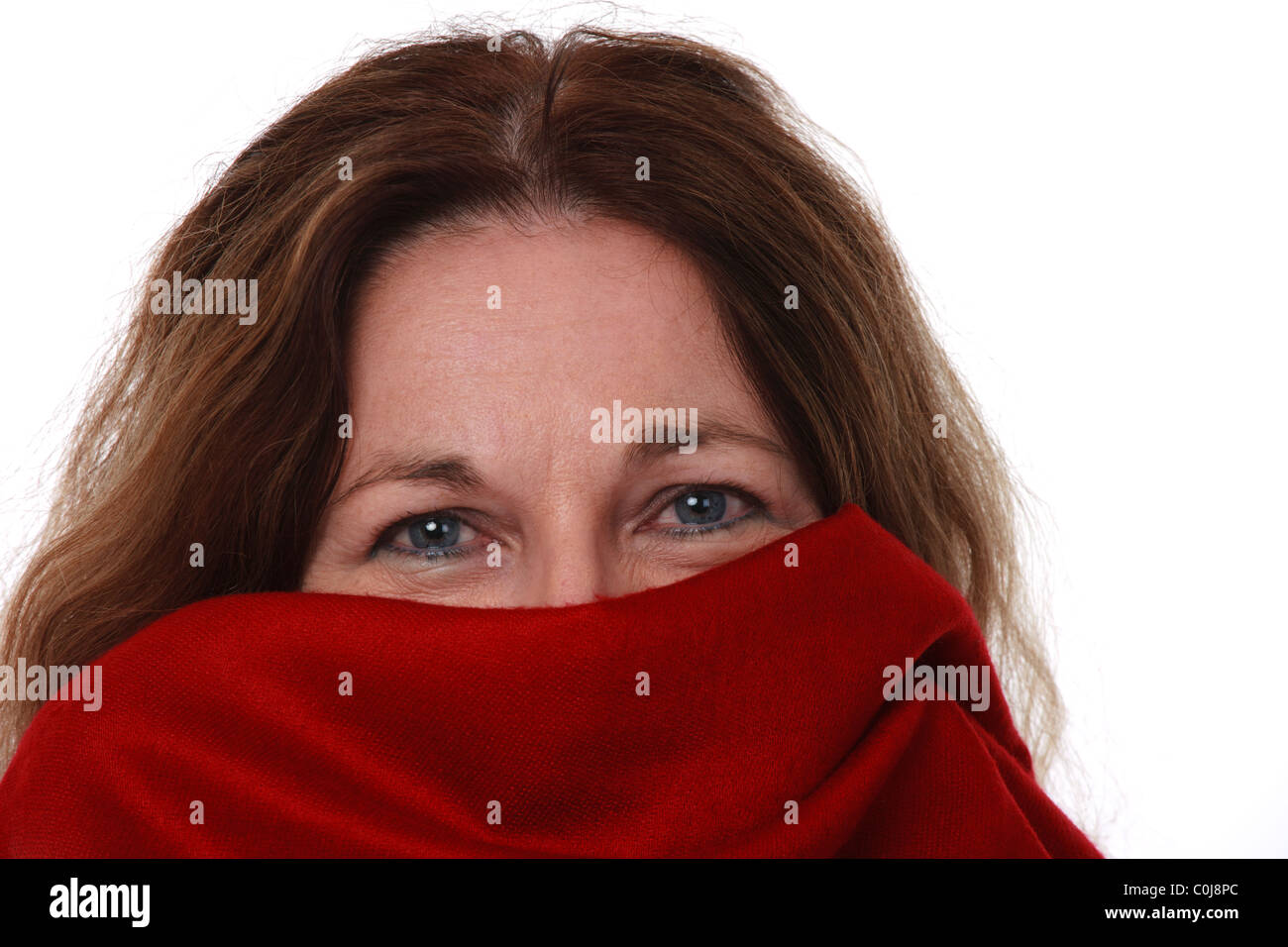 Beautiful older woman hiding face Stock Photo - Alamy
