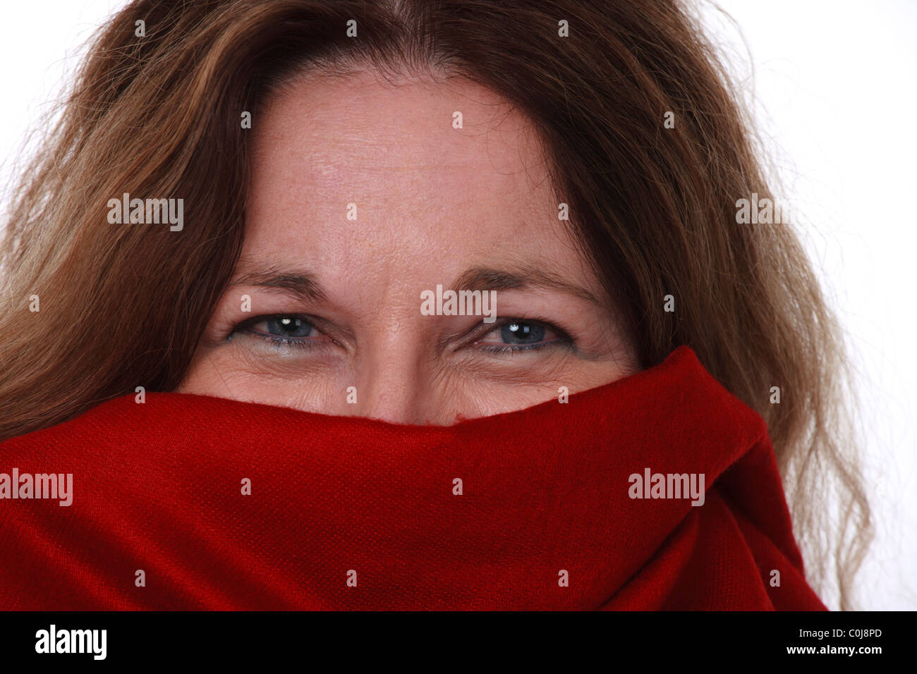 Beautiful older woman hiding face Stock Photo - Alamy