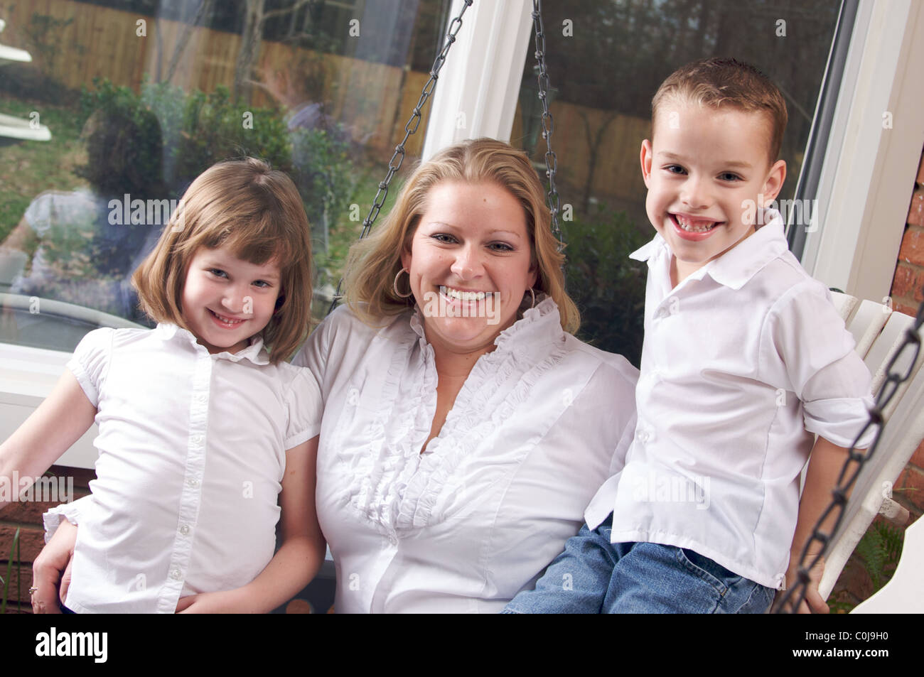 Mother and Children Enjoying a Fun Moment Stock Photo - Alamy