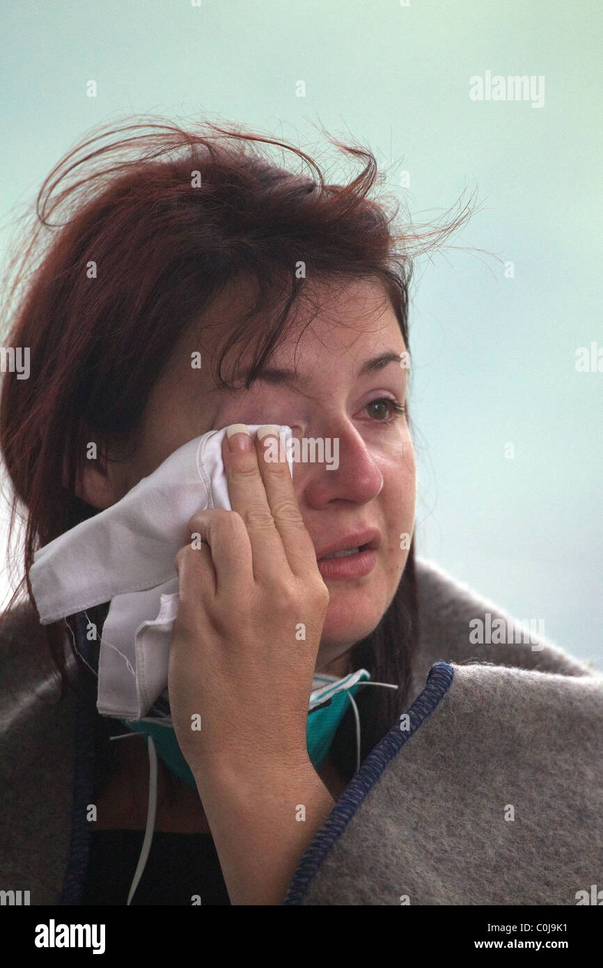 A women cries after the aftermath after a Powerful earth quake ripped ...