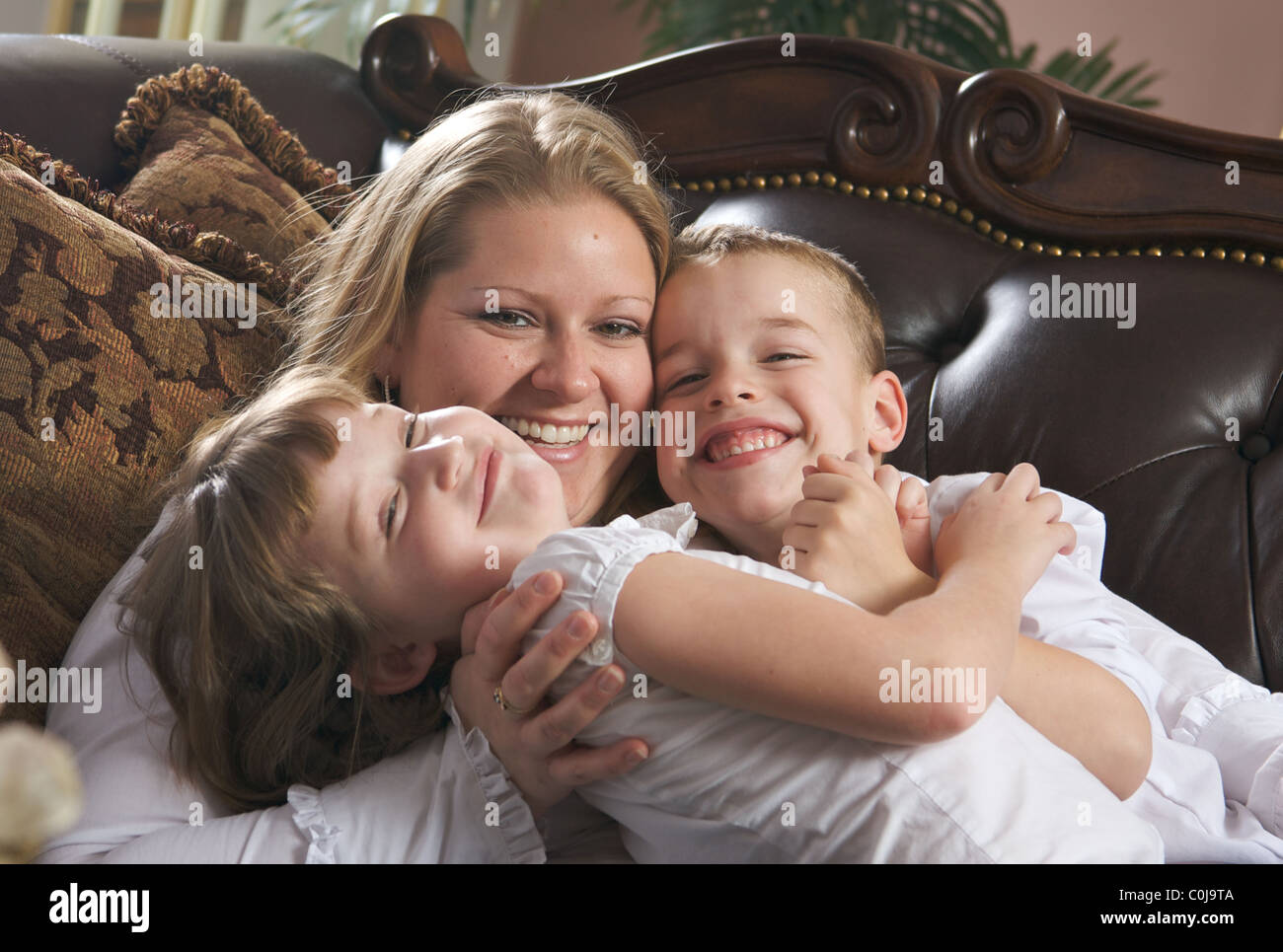 Mother and Children Enjoying a Fun Moment Stock Photo - Alamy