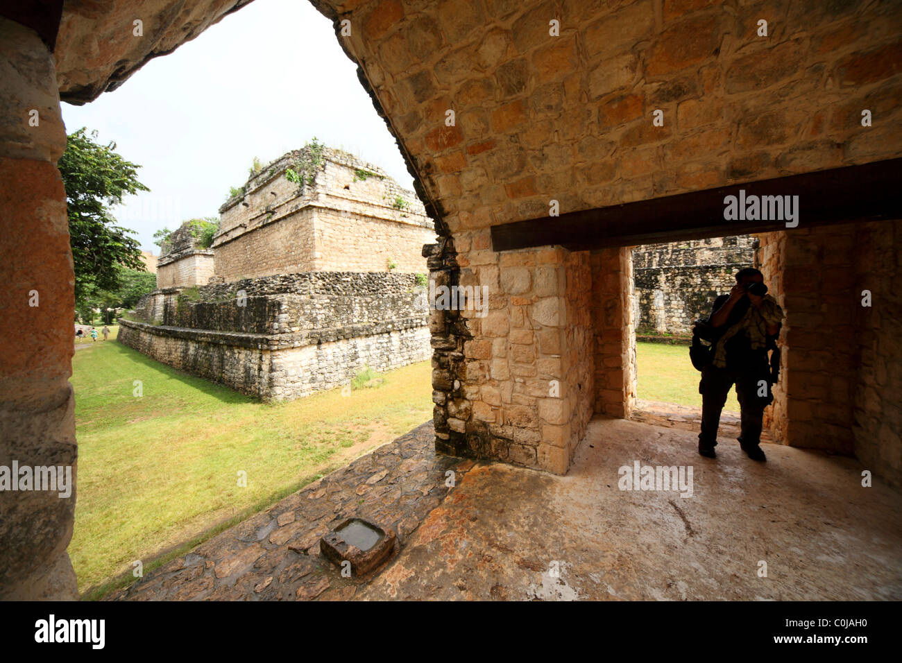 PHOTOGRAPHER AT THE SACABE ARCH, MAYAN RUINS OF EK BALAM, YUCATAN ...