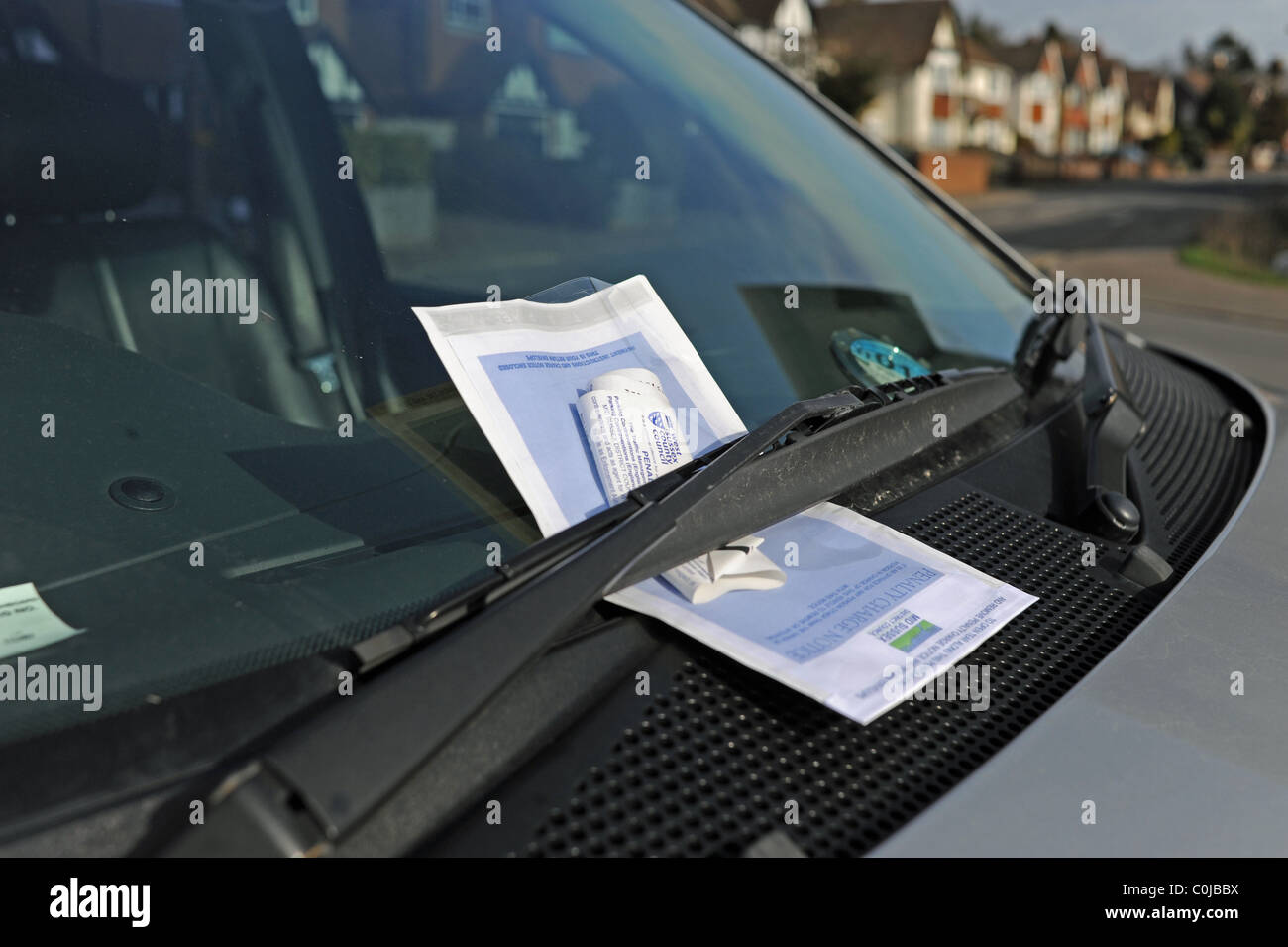 Car park parking ticket fine on a car windscreen at East Grinstead ...