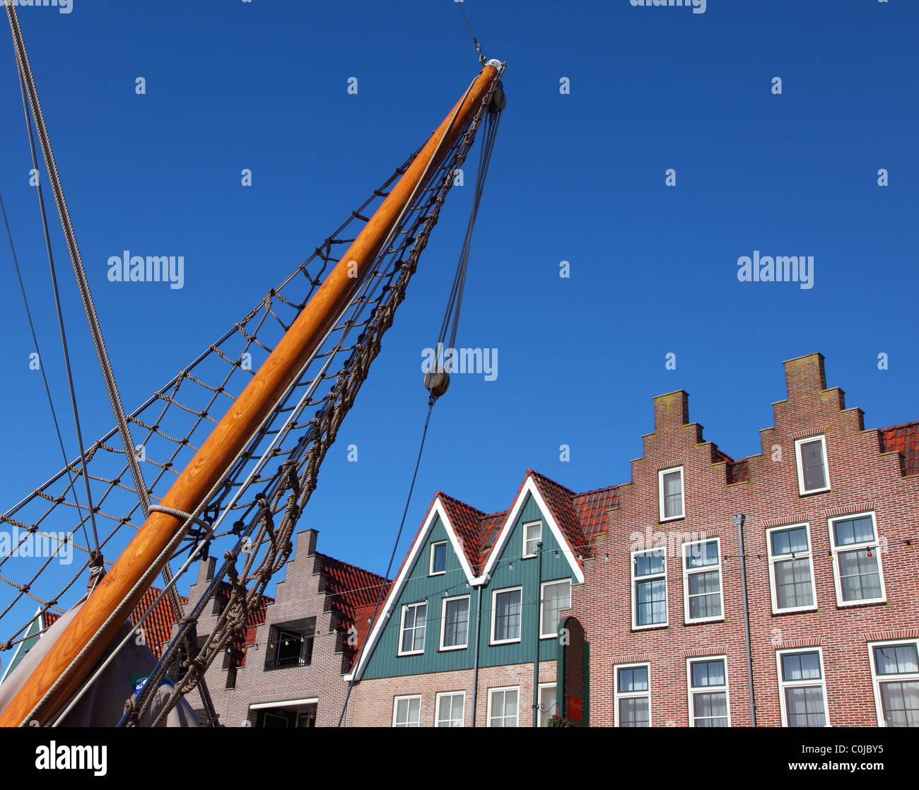 At home on ancient quay and seaport in the Dutch small city of Volendam ...