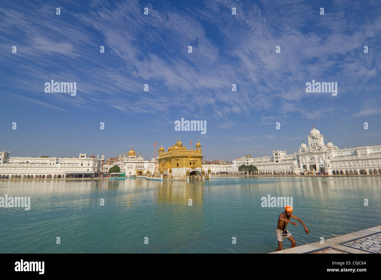 Sikh pilgrim bathing in the Sarovar (Holy Pool of Immortal Nectar ...