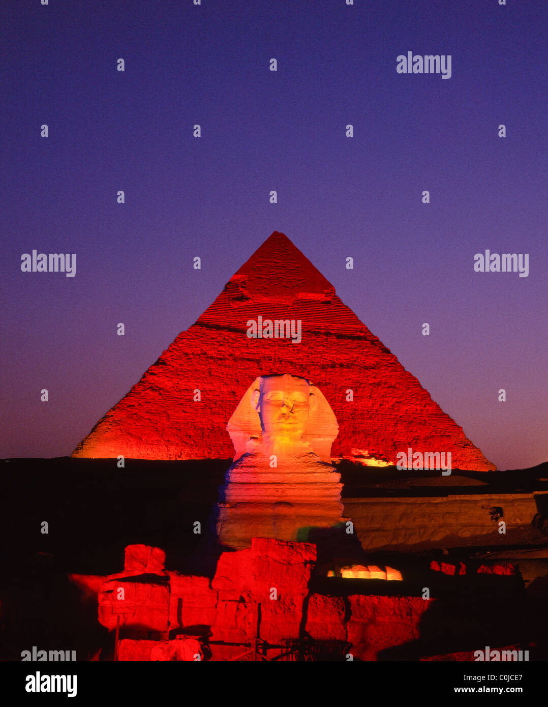 Egypt, Giza, Sphinx & Pyramid illuminated at twilight Stock Photo - Alamy