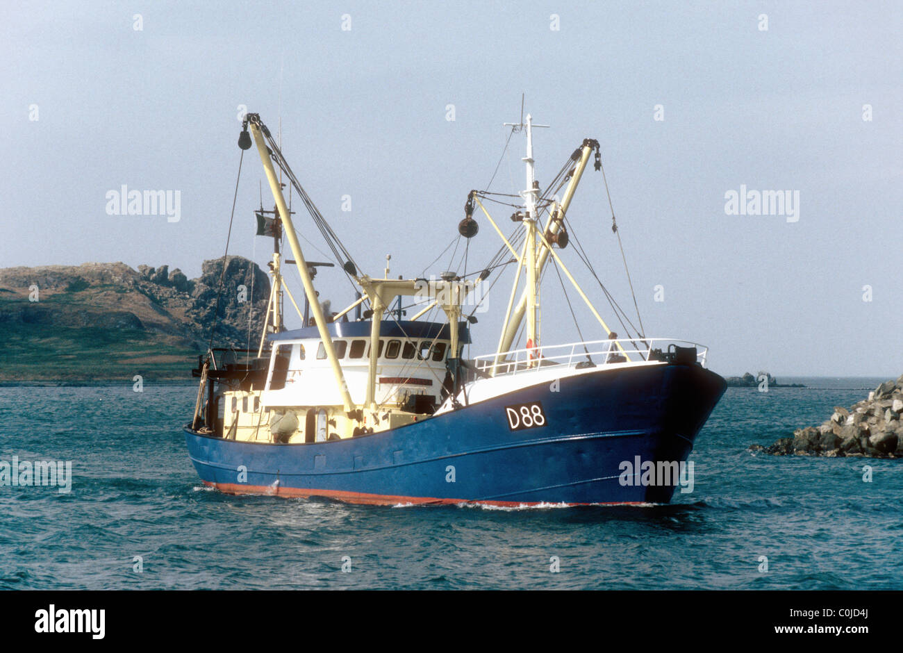 A beam trawler motor fishing vessel returns to port at Howth near ...