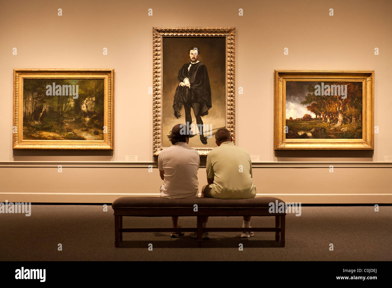 2 persons looking at art in the National Gallery of Art Building in ...