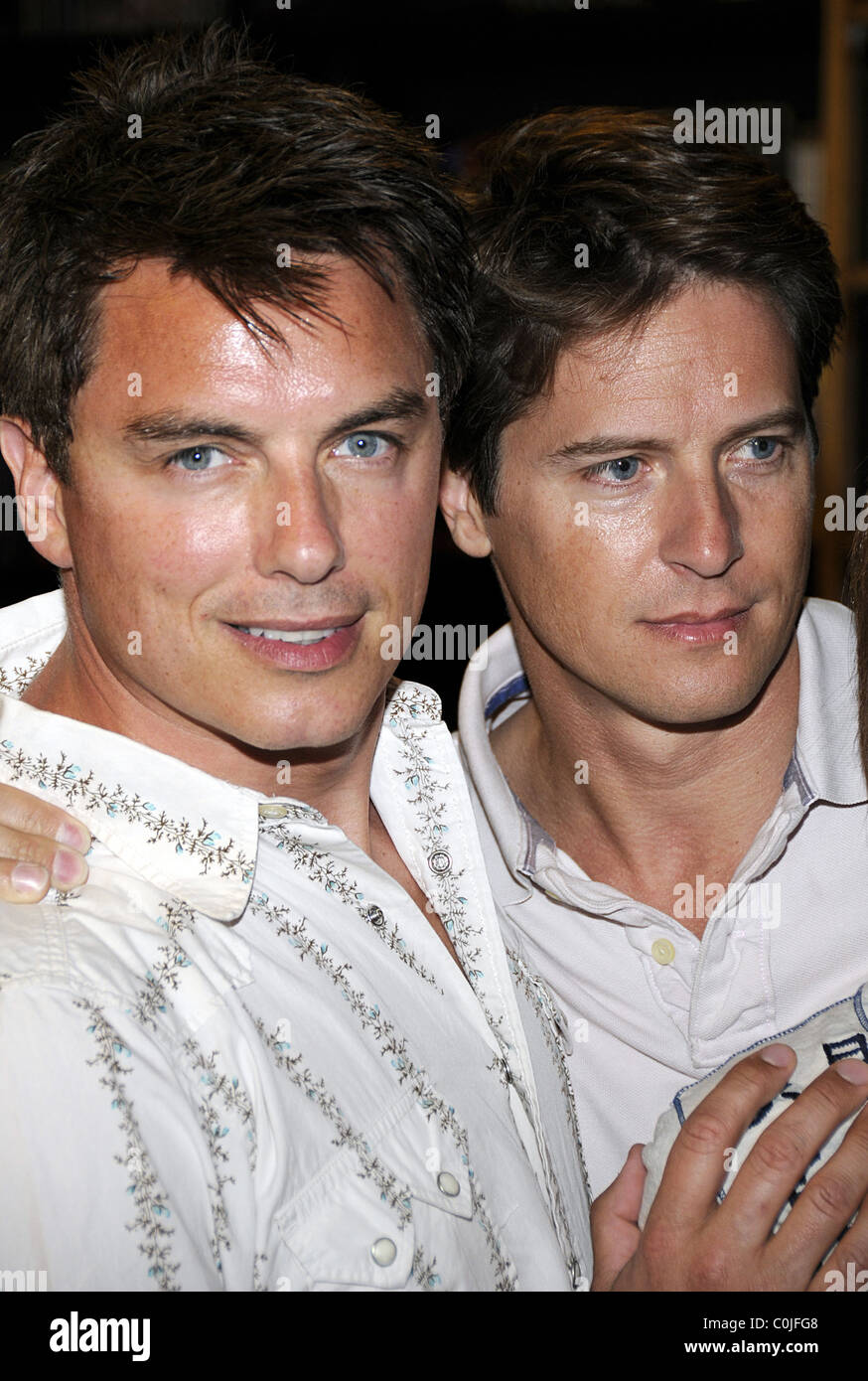 John Barrowman and his partner Scott Gill promote his autobiography ...