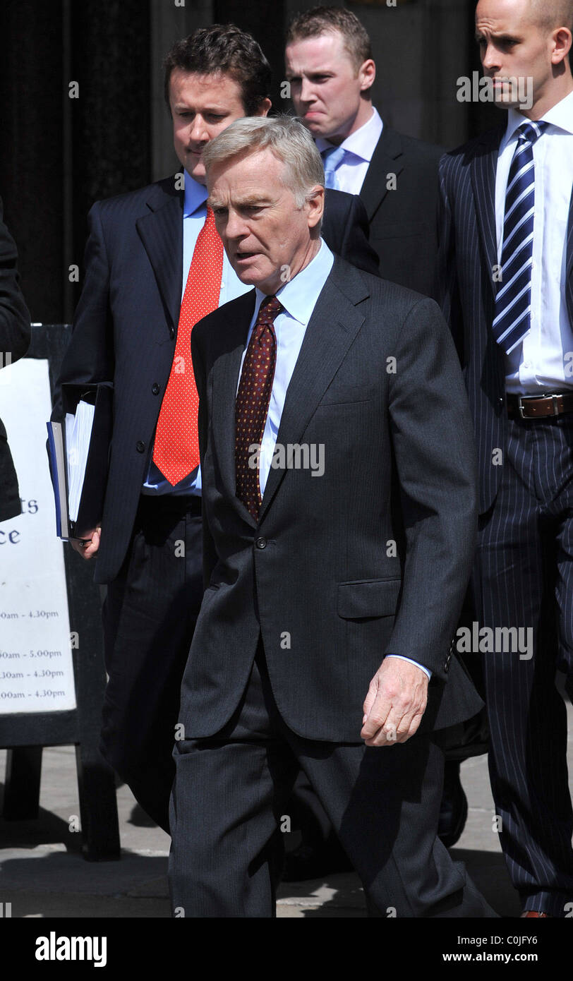 FIA boss Max Mosley leaves the Royal Courts of Justice in London ...