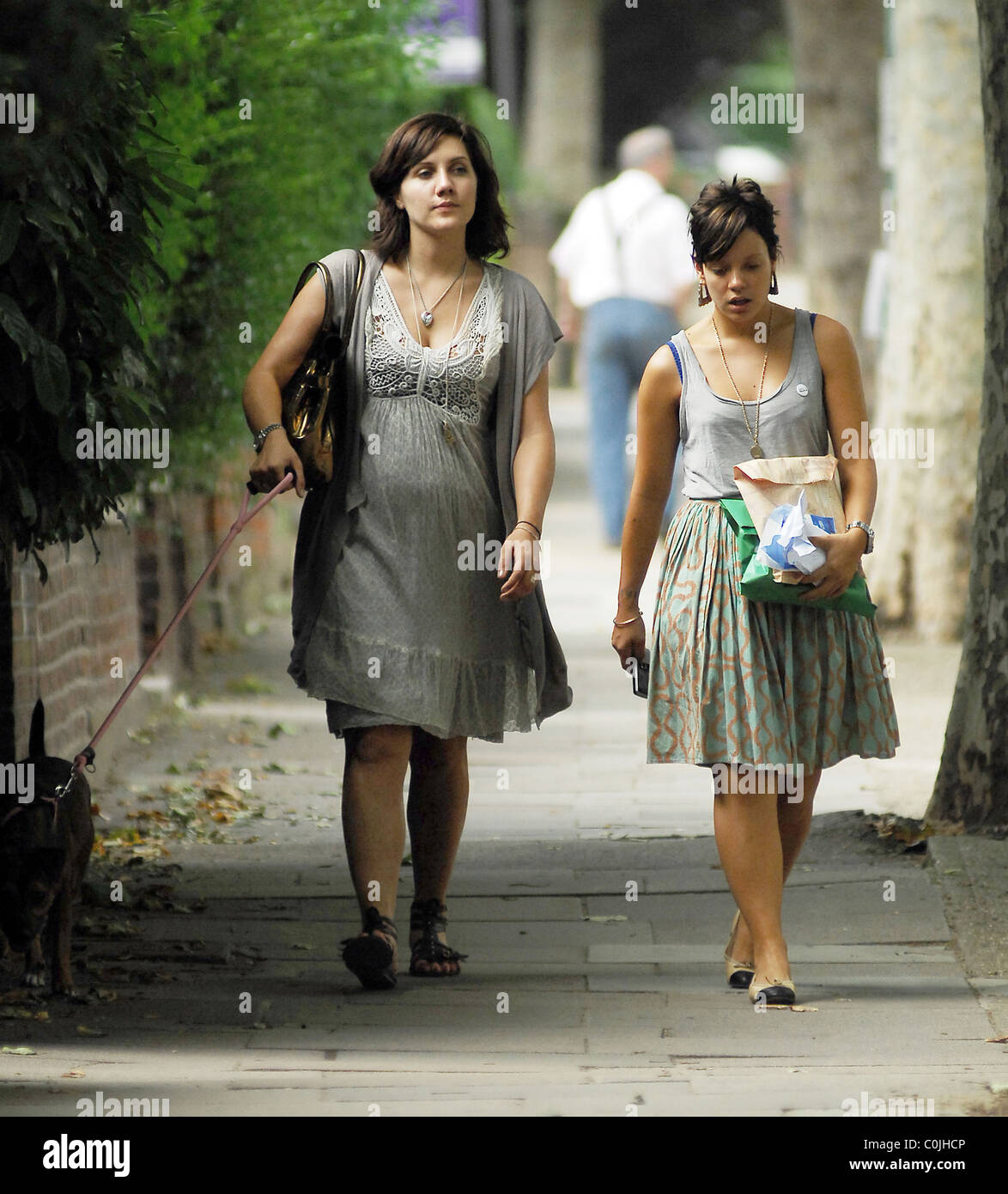 Lily Allen meets up with a friend while out walking her dog London ...