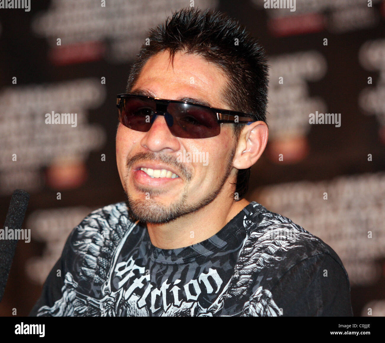 Antonio Margarito celebrates at a press conference after defeating ...