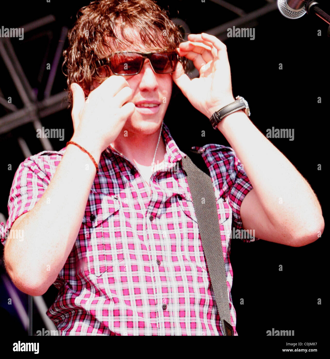 Danny Jones of McFly performing on stage at Party in the Park at Temple ...