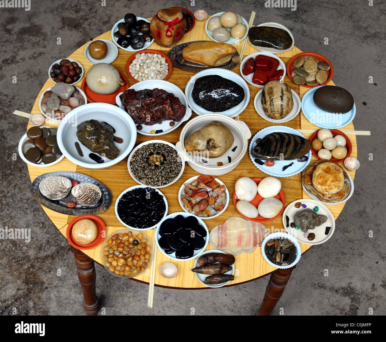 * MAN COLLECTS STONE DISHES This Chinese man doesn't set his table with ...
