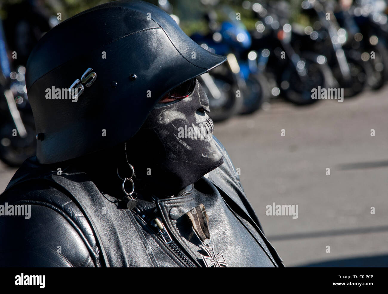 Motorcyclist in fancy dress at motorcycle gathering Stock Photo - Alamy