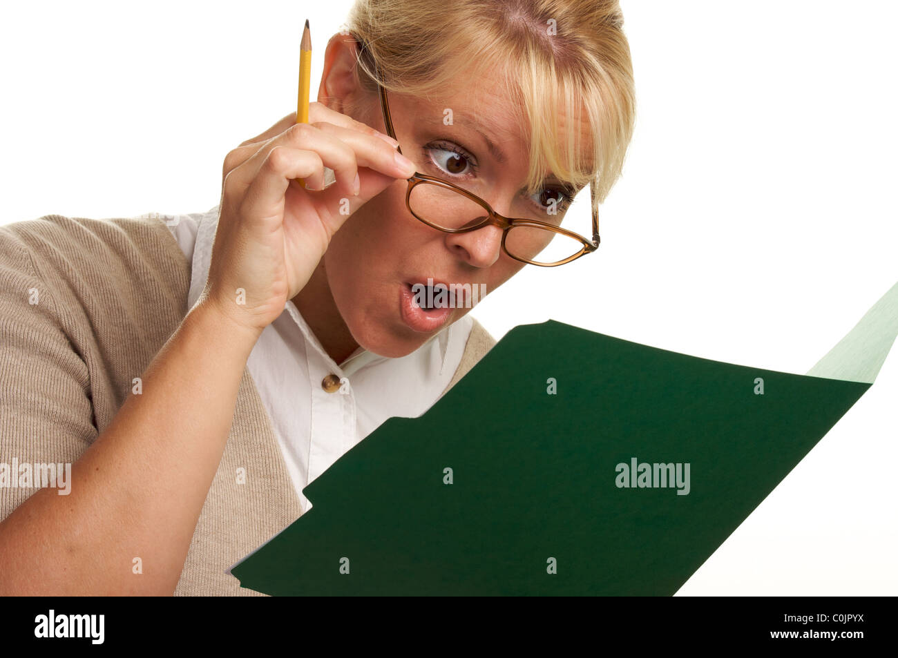 Surprised Woman with Pencil and Folder taking notes Stock Photo - Alamy