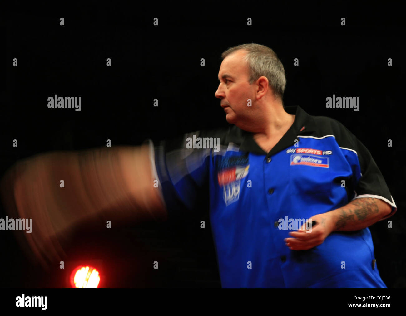Phil 'The Power' Taylor in action against Terry Jenkins at the PDC ...