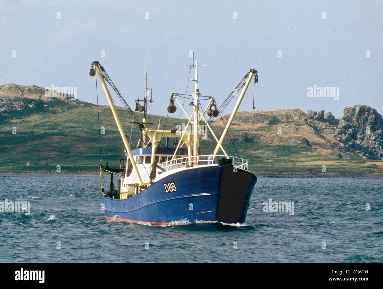 A beam trawler motor fishing vessel returns to port at Howth near ...