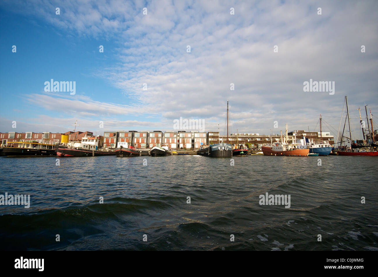 Buildings canal sea Amsterdam Stock Photo - Alamy