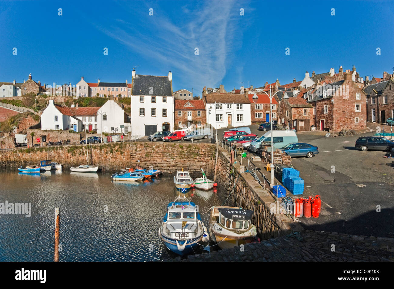 Crail Harbour in Crail Fife Scotland with small craft beached on the ...