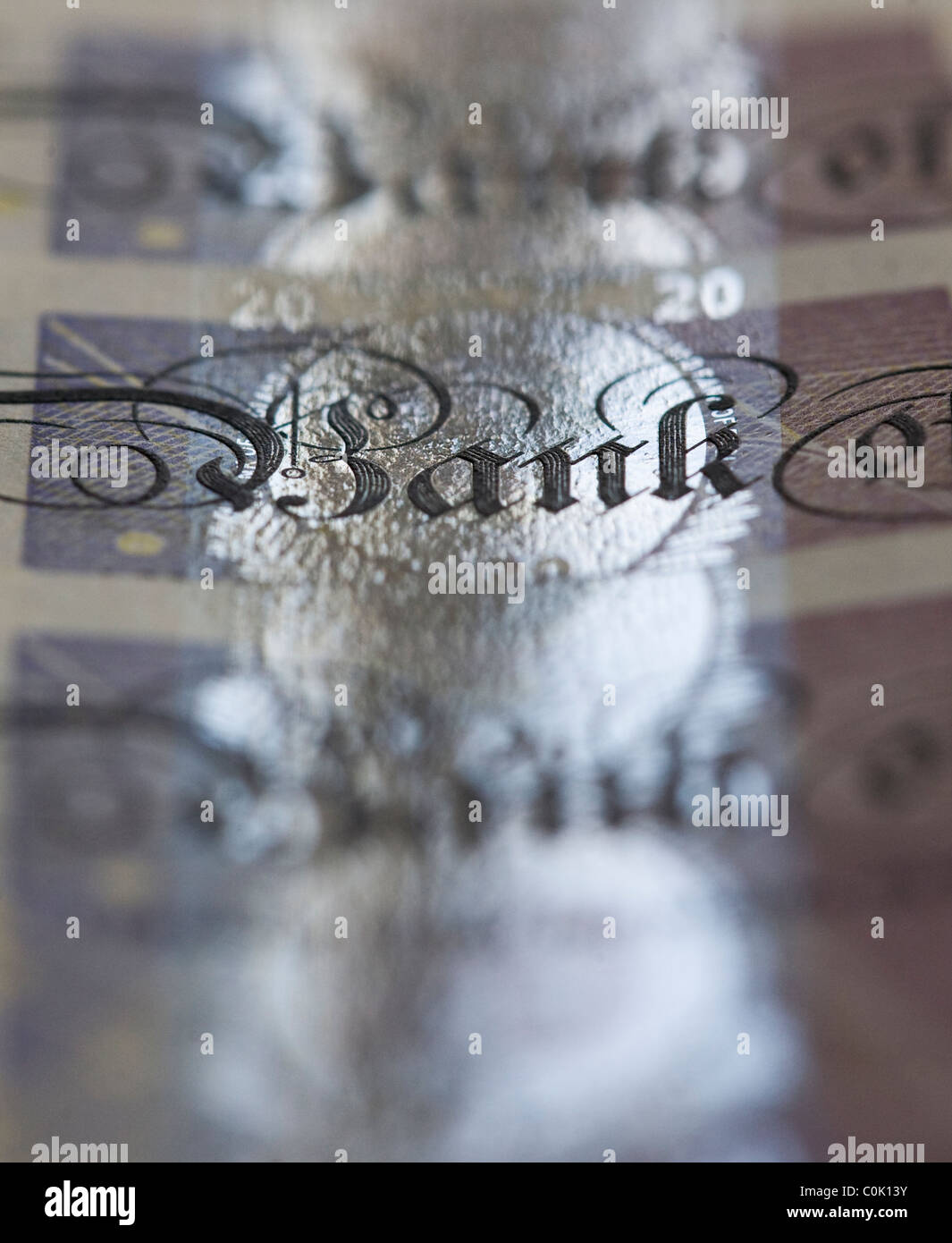 Twenty pound sterling notes with the Bank of England written on them ...