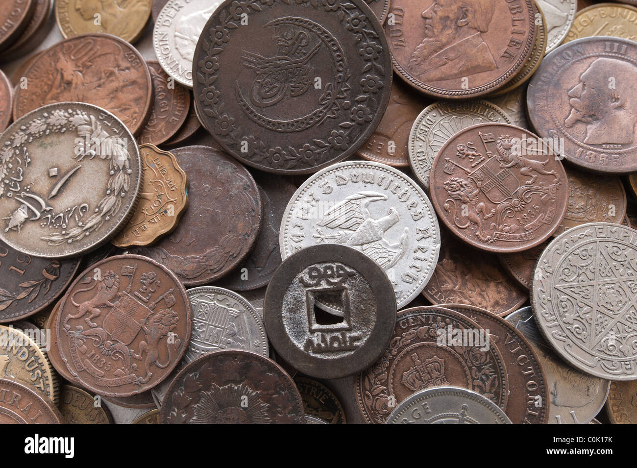 foreign currency multicultural wealth as small change Stock Photo - Alamy