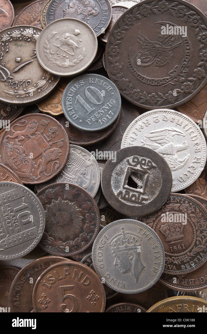foreign currency multicultural wealth as small change Stock Photo - Alamy